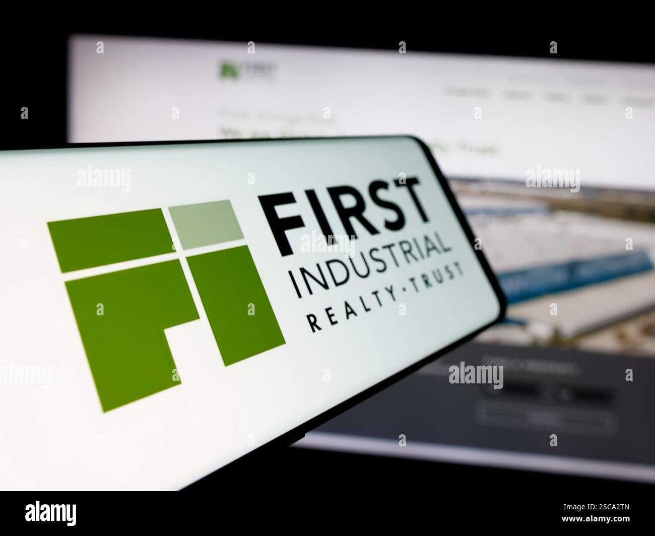 In this photo illustration, a mobile phone with the logo of American ...