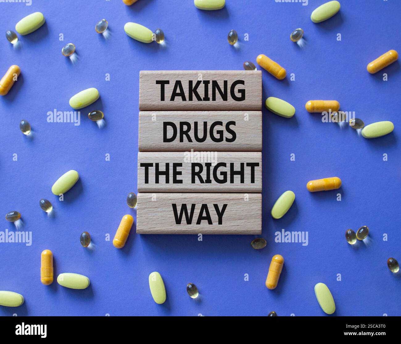 Medicine symbol. Concept word Taking drugs the right way on wooden ...