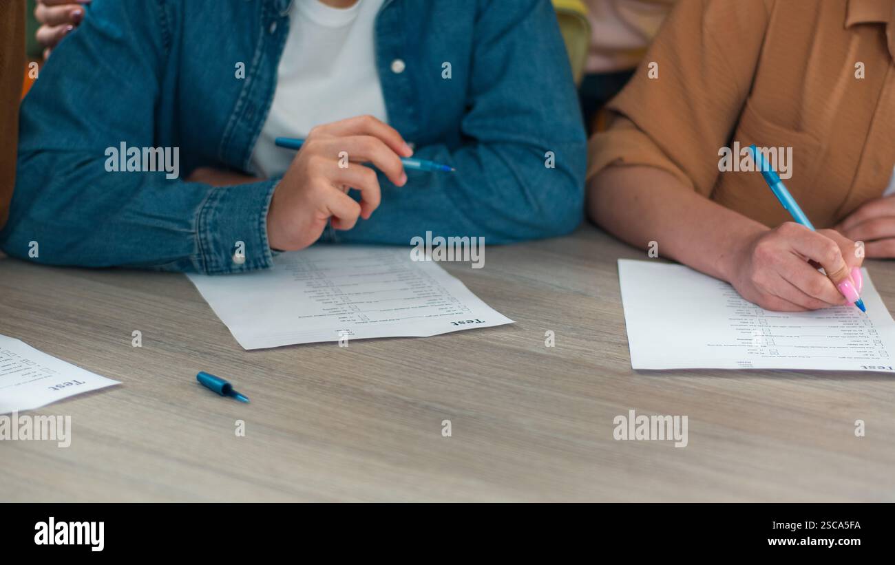 Unrecognizable cropped view close up school Caucasian students learn ...