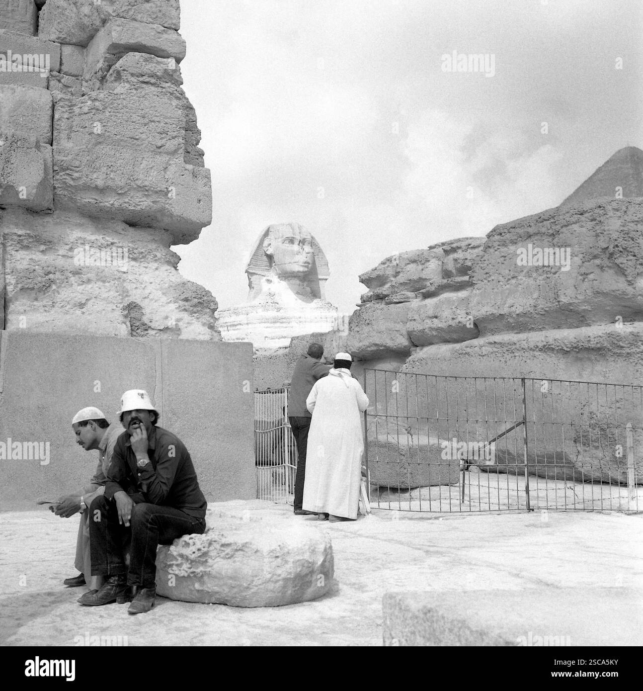 Man waiting in front Black and White Stock Photos & Images - Alamy