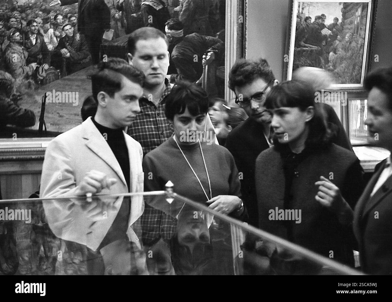 Group and a museum tour guide talking about Lenin in the Lenin-Museum ...