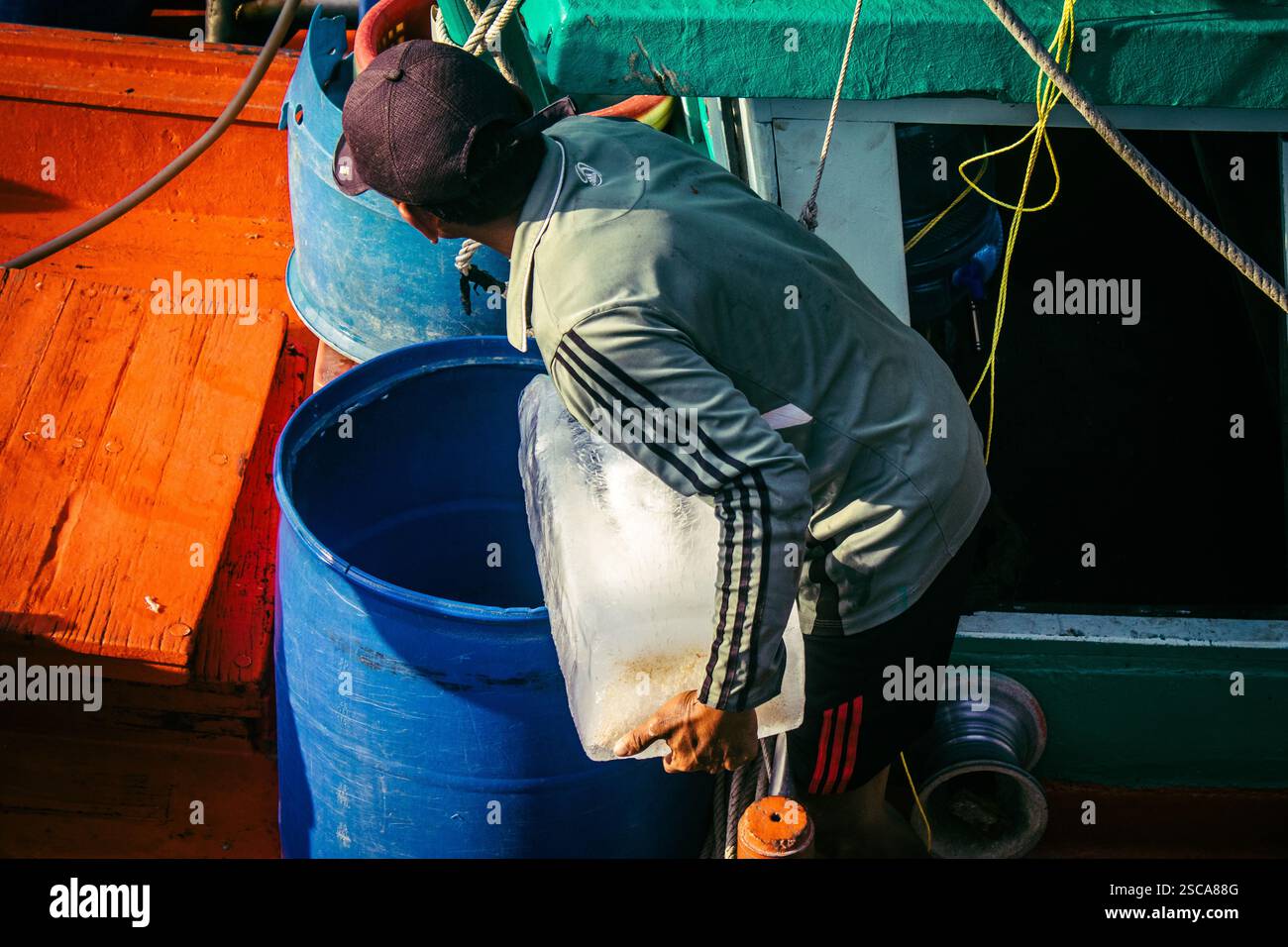 Preak Svay, Koh Rong Island, Cambodia, February 6, 2025 Fisherman in an ...