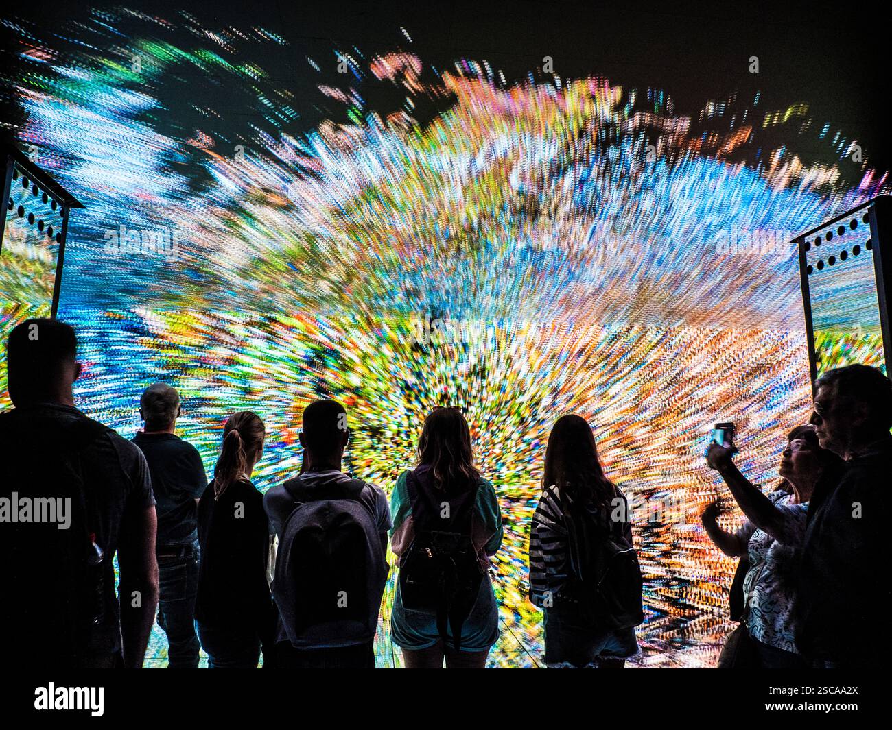 Visitors inside the Gaudi Cube by Refik Anadol, an LED immersice ...