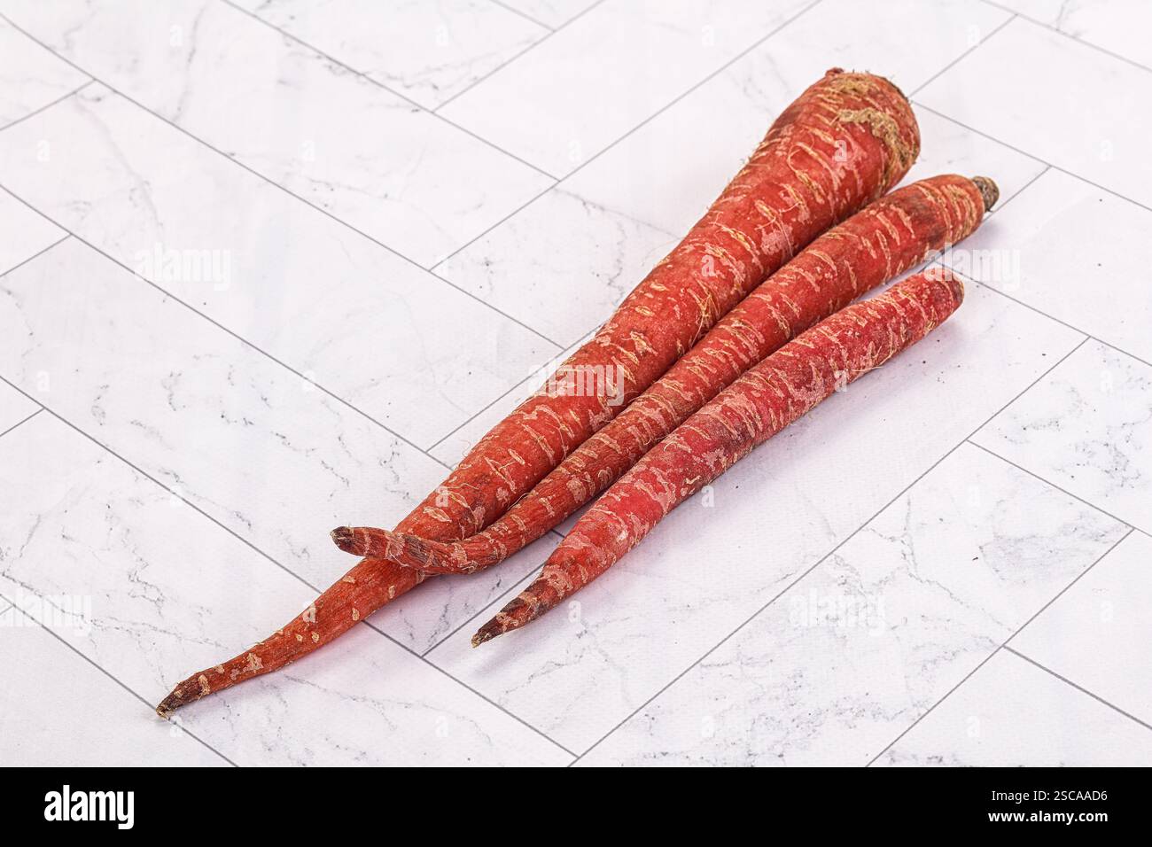 Red Indian raw carrot vegetable root Stock Photo - Alamy