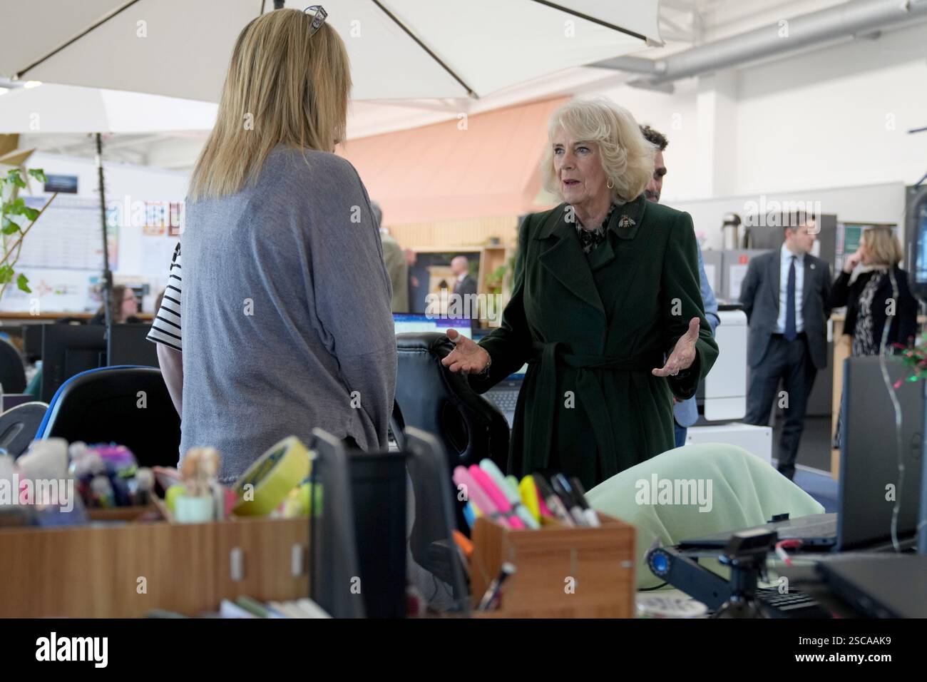 Queen Camilla meets staff during a visit to CoLab Exeter, a multi ...