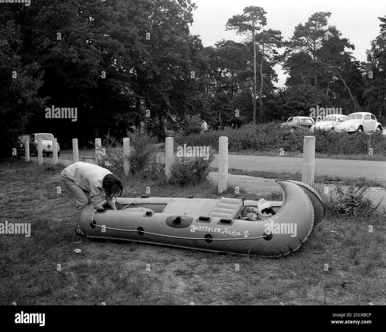 Woman inflatable boat Black and White Stock Photos & Images - Alamy