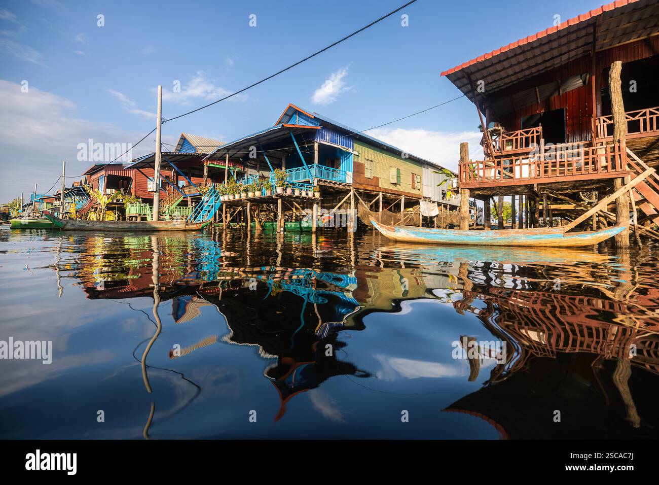 Kampong Phluk floating village with stilt houses on Tonle Sap lake in ...