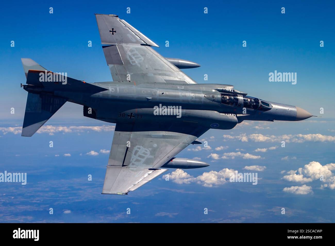 A German Air Force McDonnell Douglas F-4 Phantom II flying at high ...
