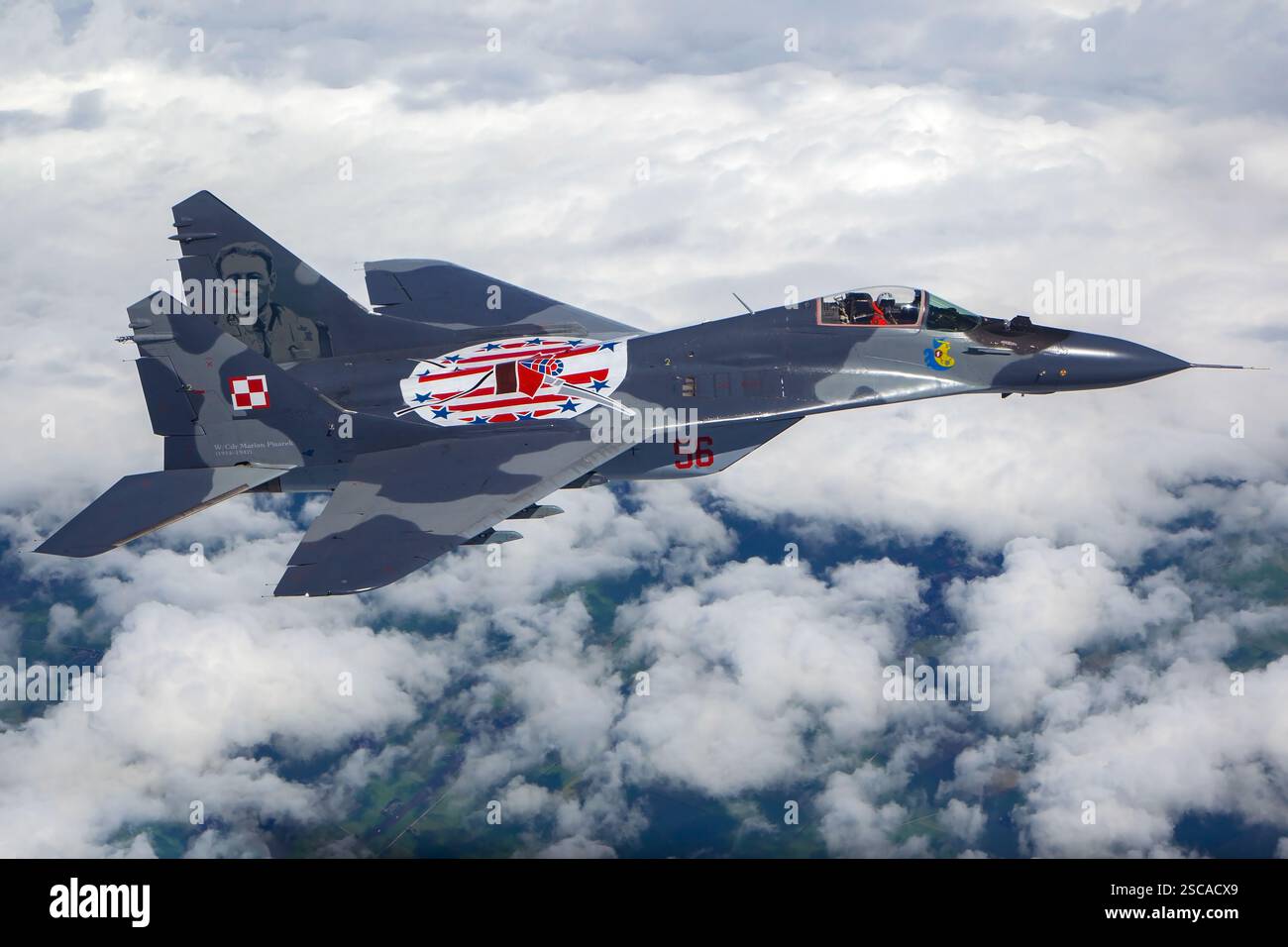 A Polish Air Force Mikoyan MiG-29 performing a high-speed maneuver ...