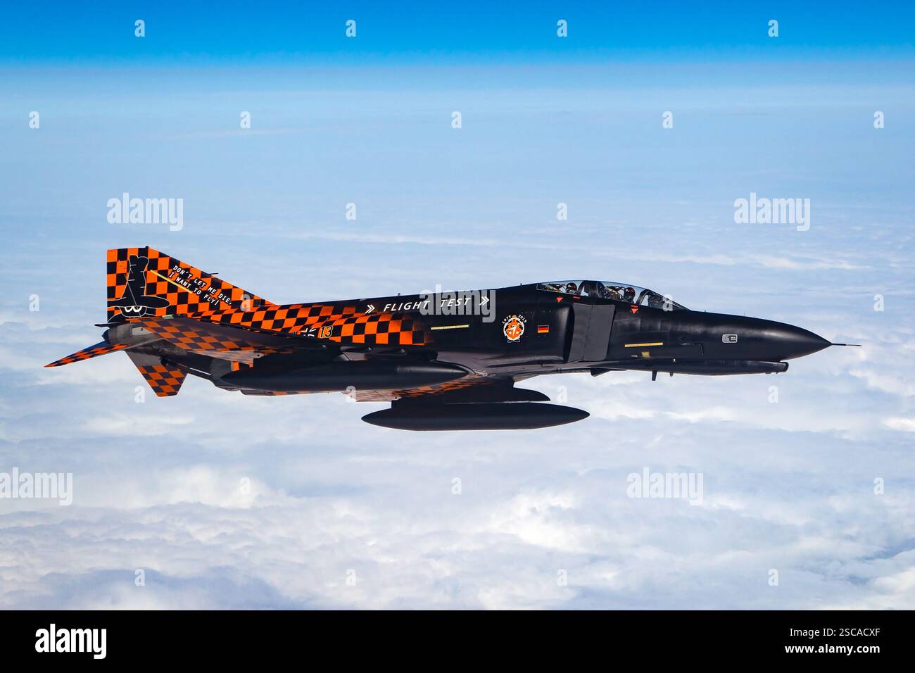 A German Air Force McDonnell Douglas F-4 Phantom II flying in formation ...