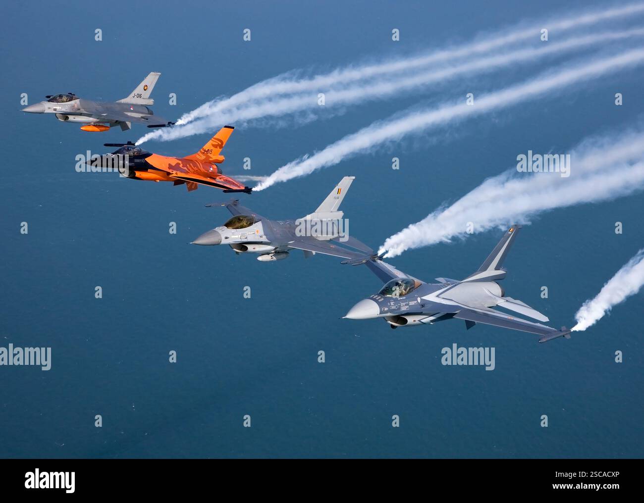 4-ship formation of Belgian and Dutch F-16 demo teams performing high ...