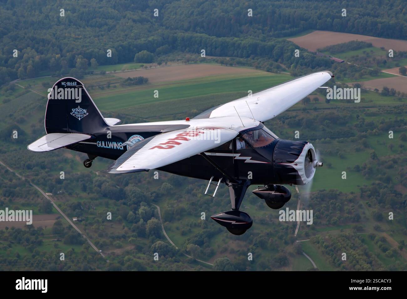 A Stinson 108 flying during an air-to-air photo shoot. The Stinson 108 ...