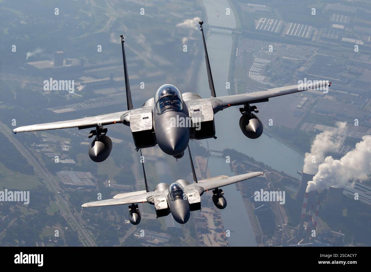 A United States Air Force F-15 Eagle fighter jet performing maneuvers ...