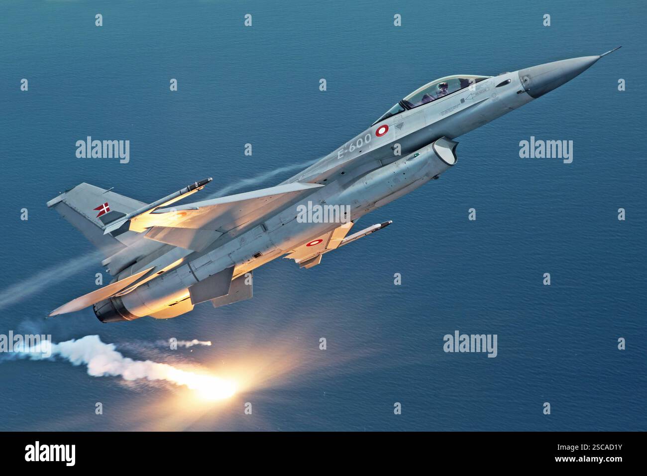A fourth shot of a Danish Air Force F-16 Fighting Falcon in flight ...