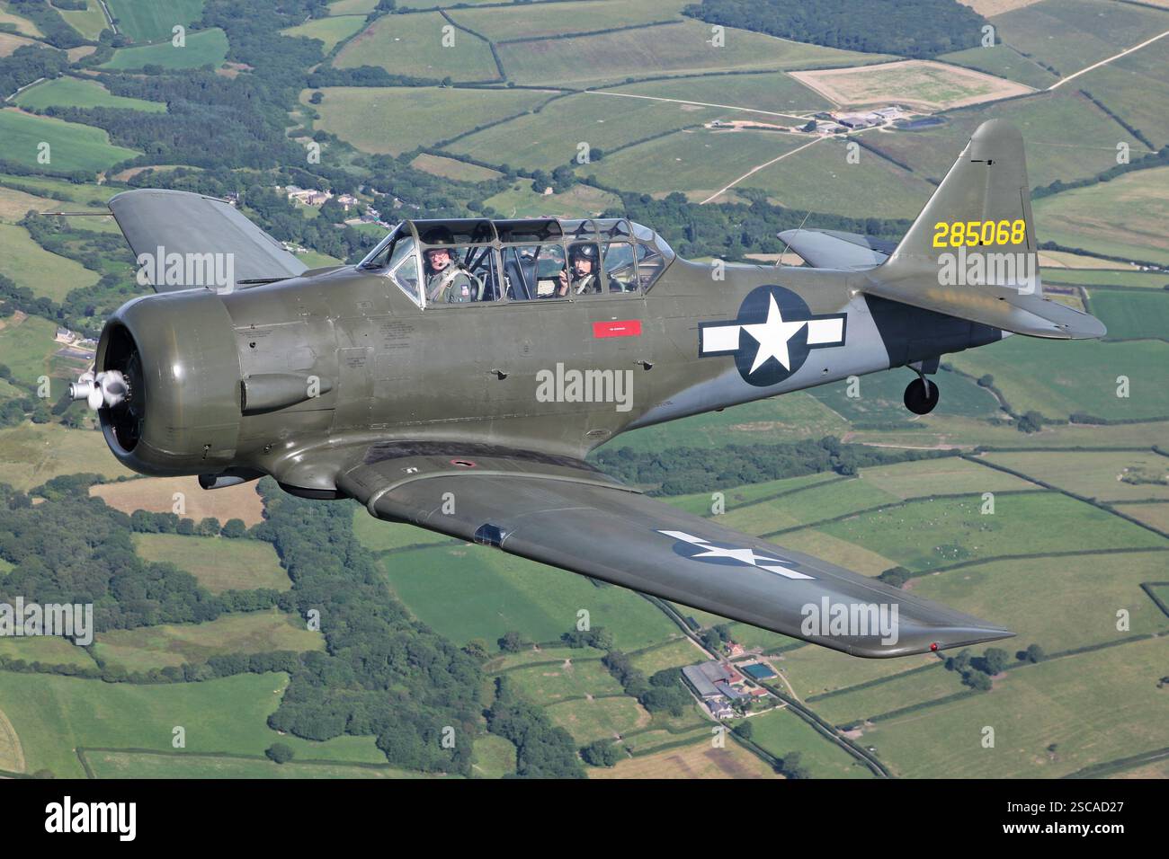 A North American T-6 Harvard, a military trainer aircraft, flying ...