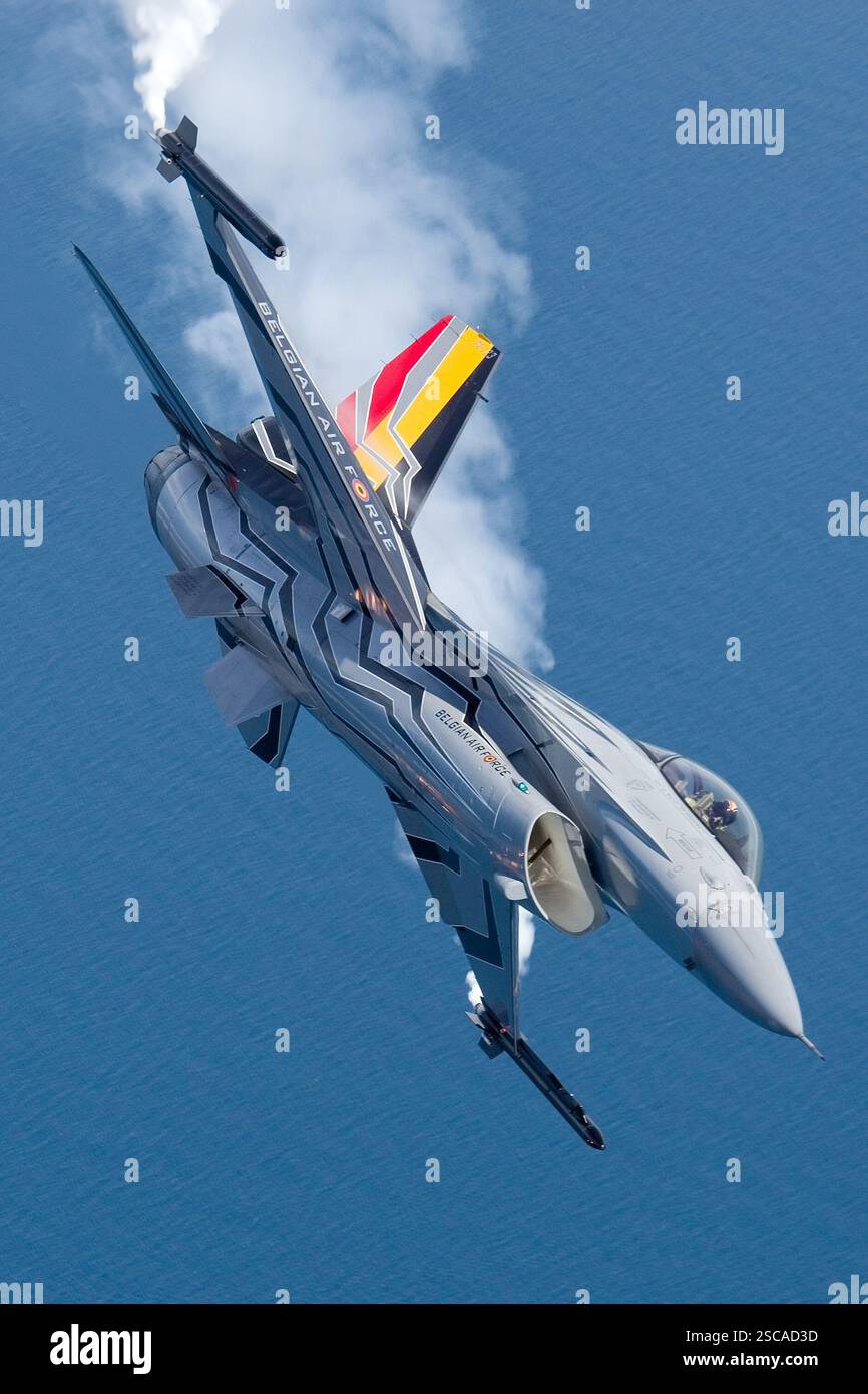 A Belgian Air Force F-16 Fighting Falcon flying in formation during an ...