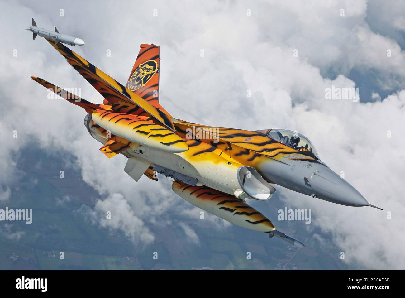 Belgian Air Force F-16 Tiger, equipped with flares, demonstrating its ...