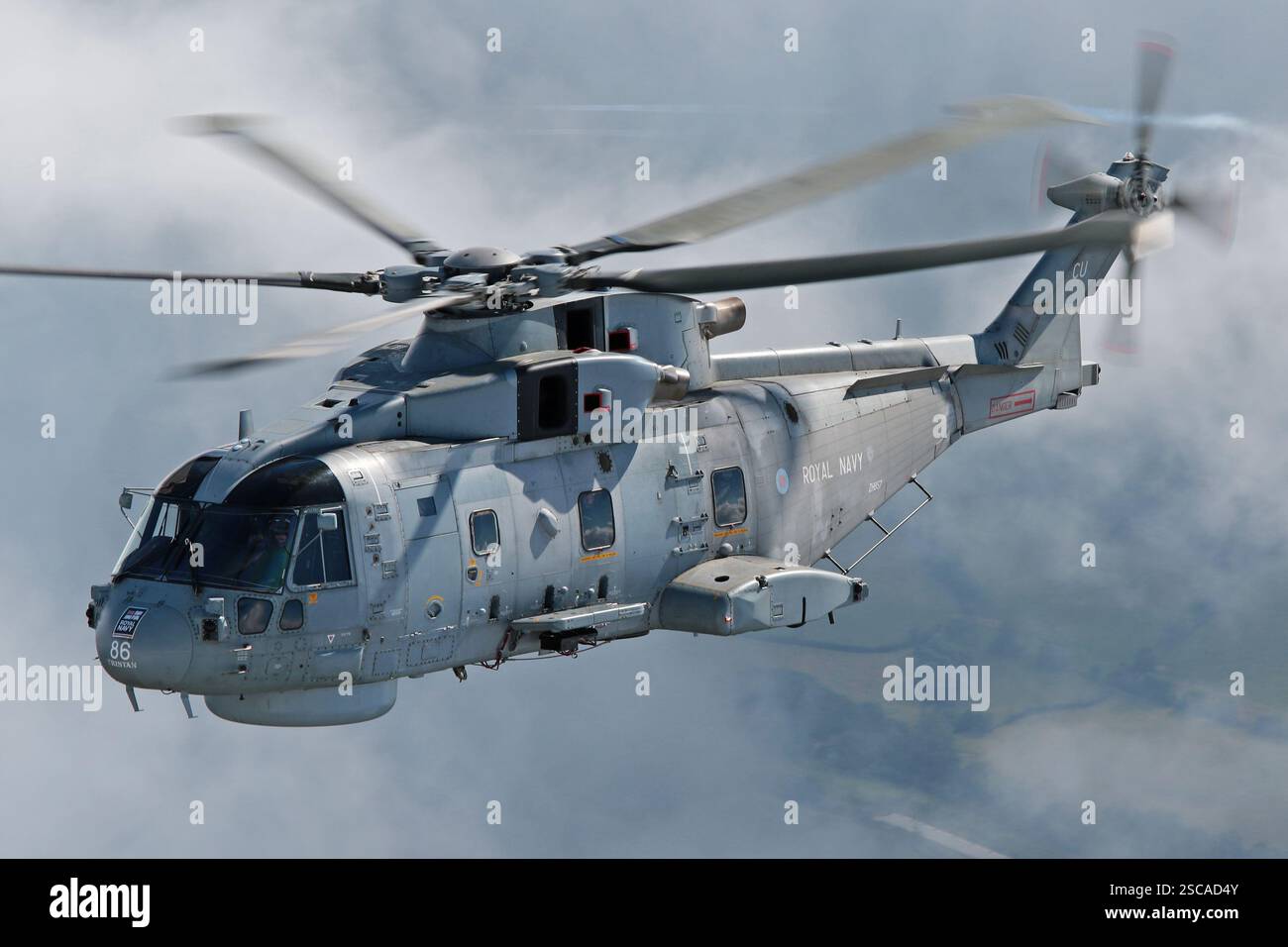 Royal Navy Merlin helicopter performing a search and rescue mission ...