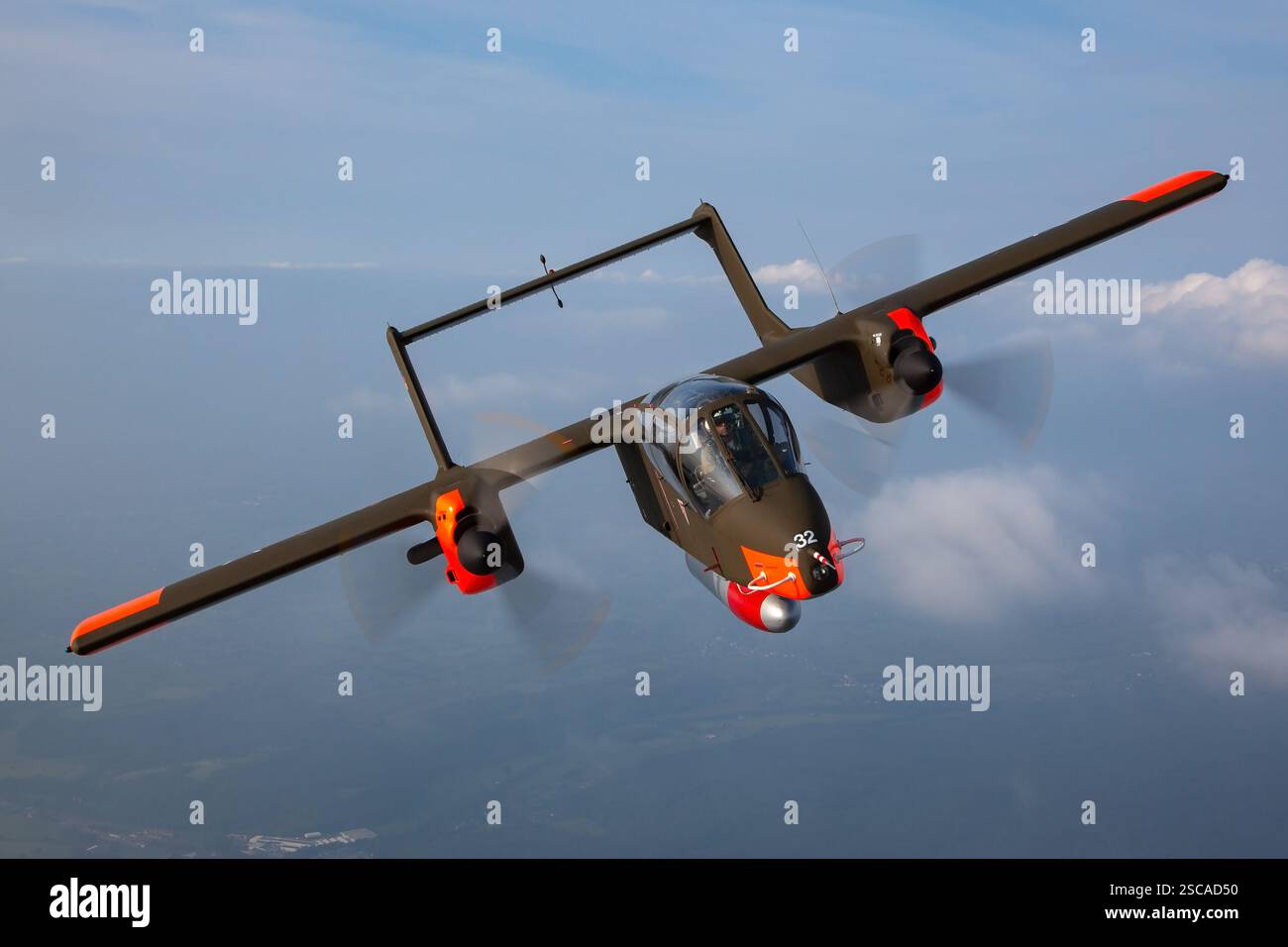 OV-10 Bronco performing a low pass during an air-to-air photo shoot ...