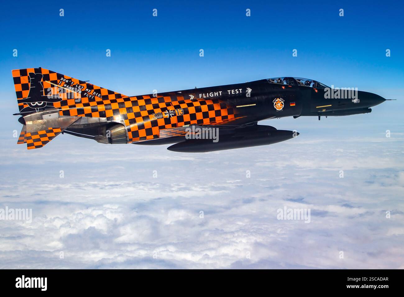 A German Air Force McDonnell Douglas F-4 Phantom II in a steep climb ...