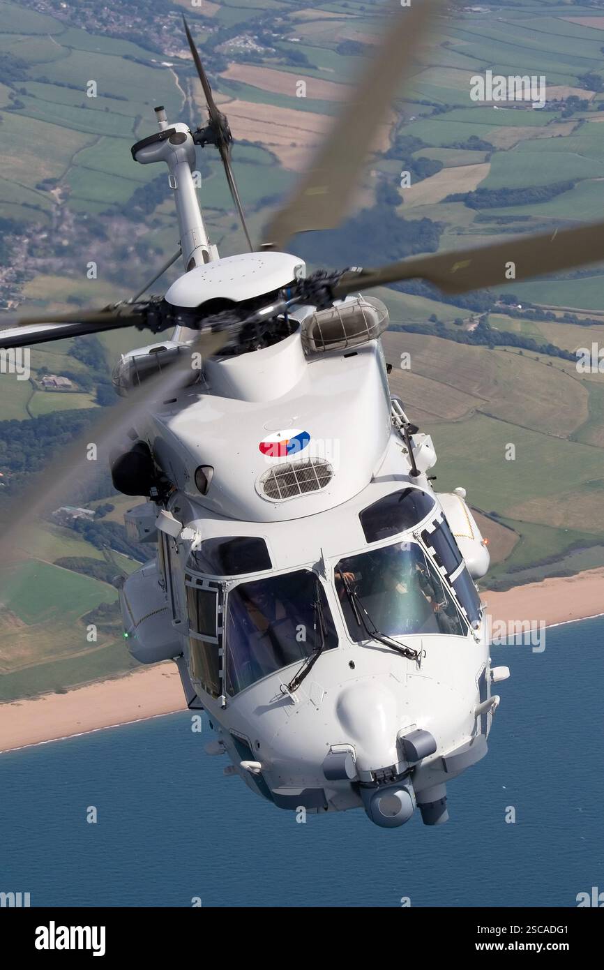 A Royal Netherlands Air Force NH90 helicopter in flight during an air ...