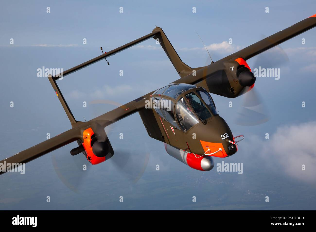 OV-10 Bronco flying in tight formation during an air-to-air photo shoot ...