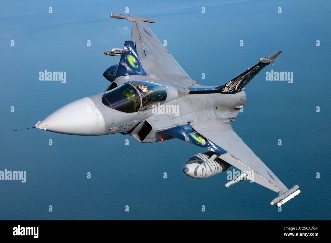 Czech Air Force Saab JAS 39 Gripen performing aerobatic maneuvers ...