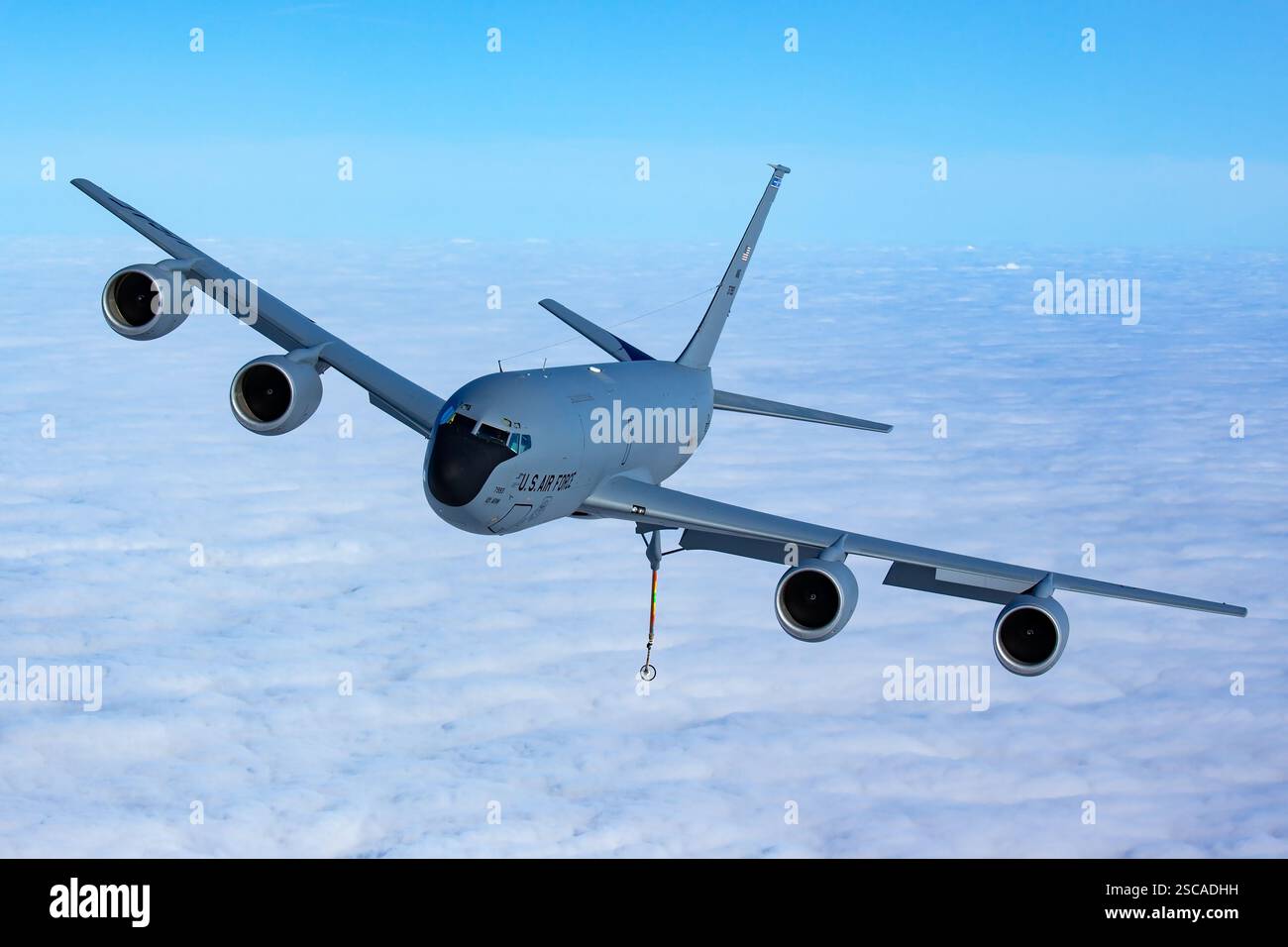 US Air Force KC-135 Stratotanker performing an aerial refueling mission ...