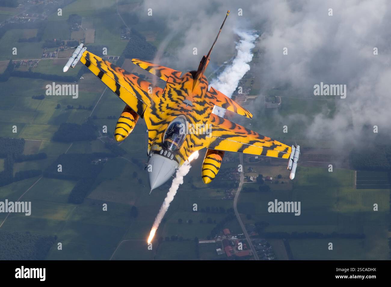 Belgian Air Force F-16 Tiger flying in formation with other fighter ...