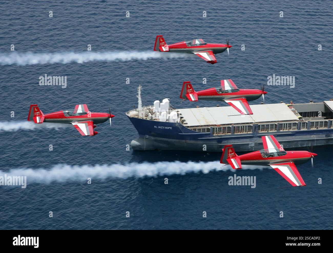 Royal Jordanian Falcons, a demonstration team flying the Extra EA-300LP ...