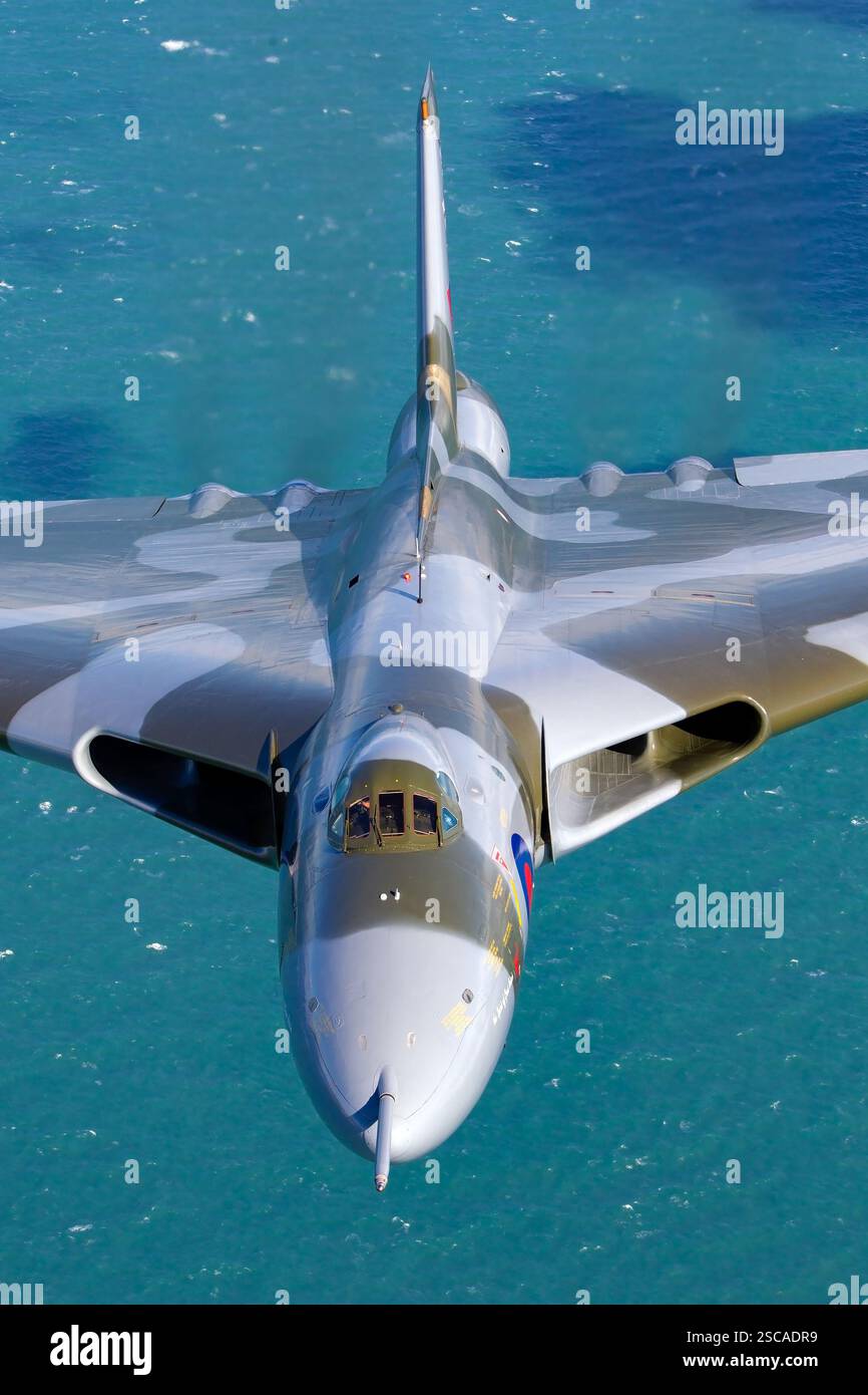 Avro Vulcan performing a maneuver during an air-to-air photo shoot ...