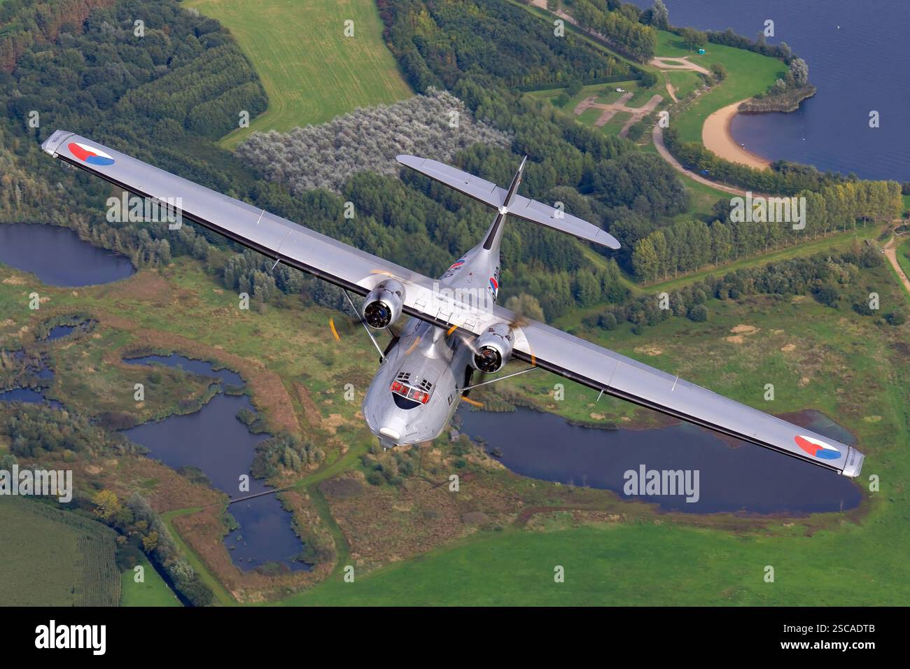 Consolidated PBY Catalina flying in an air-to-air photo shoot. The ...