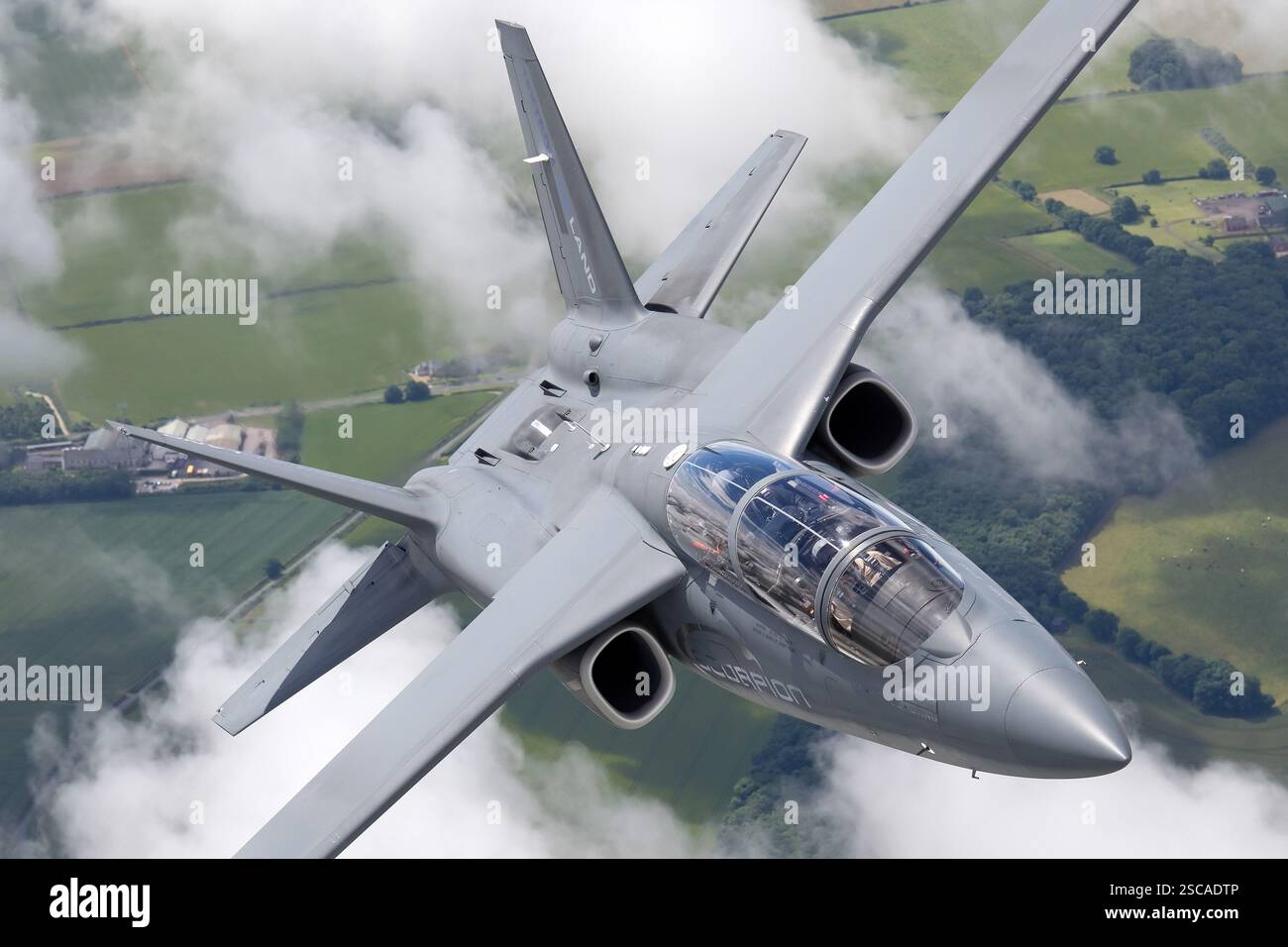Textron Scorpion performing a tight maneuver in the sky. The twin ...