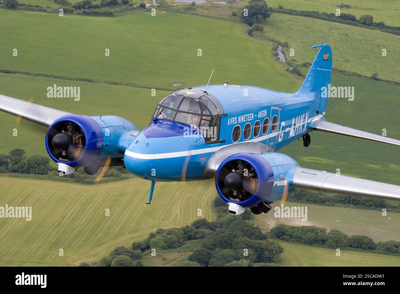 Avro Anson aircraft in flight, showcasing its design as a twin-engine ...