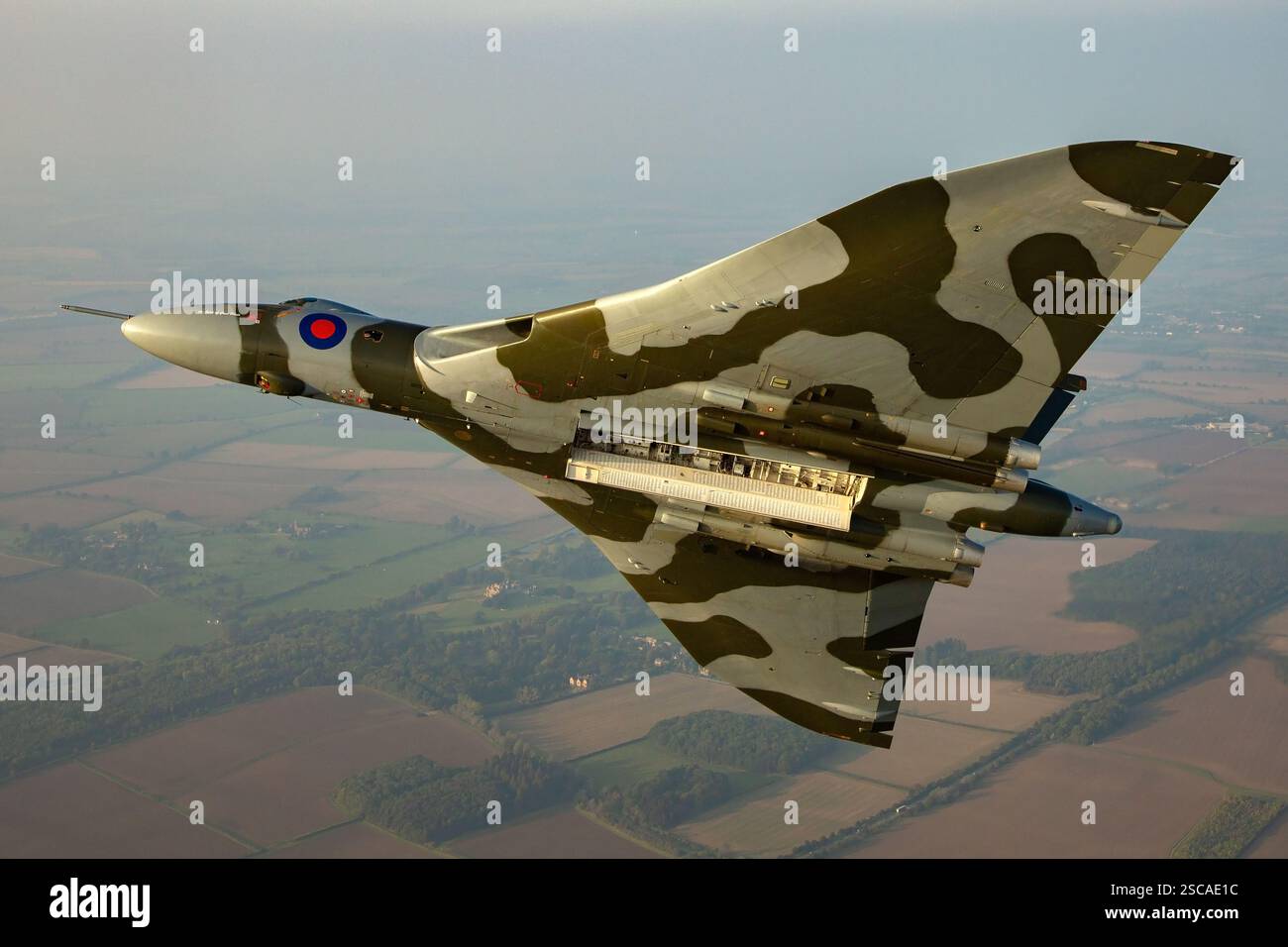 Avro Vulcan performing a banking maneuver during an air-to-air photo ...