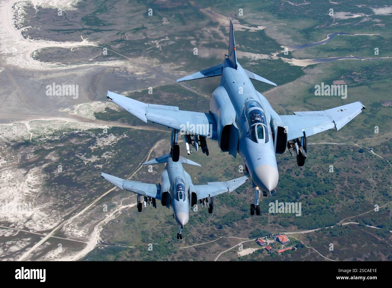 German Air Force F-4 Phantom performing an air-to-air photo shoot at ...