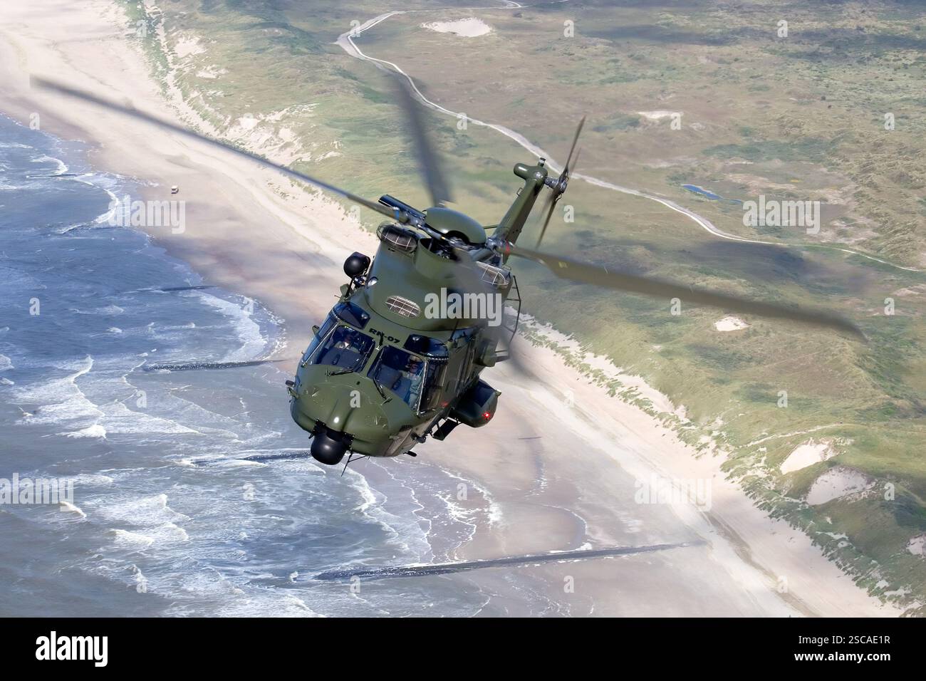 Belgian Air Force NH90 helicopter in flight during an air-to-air photo ...