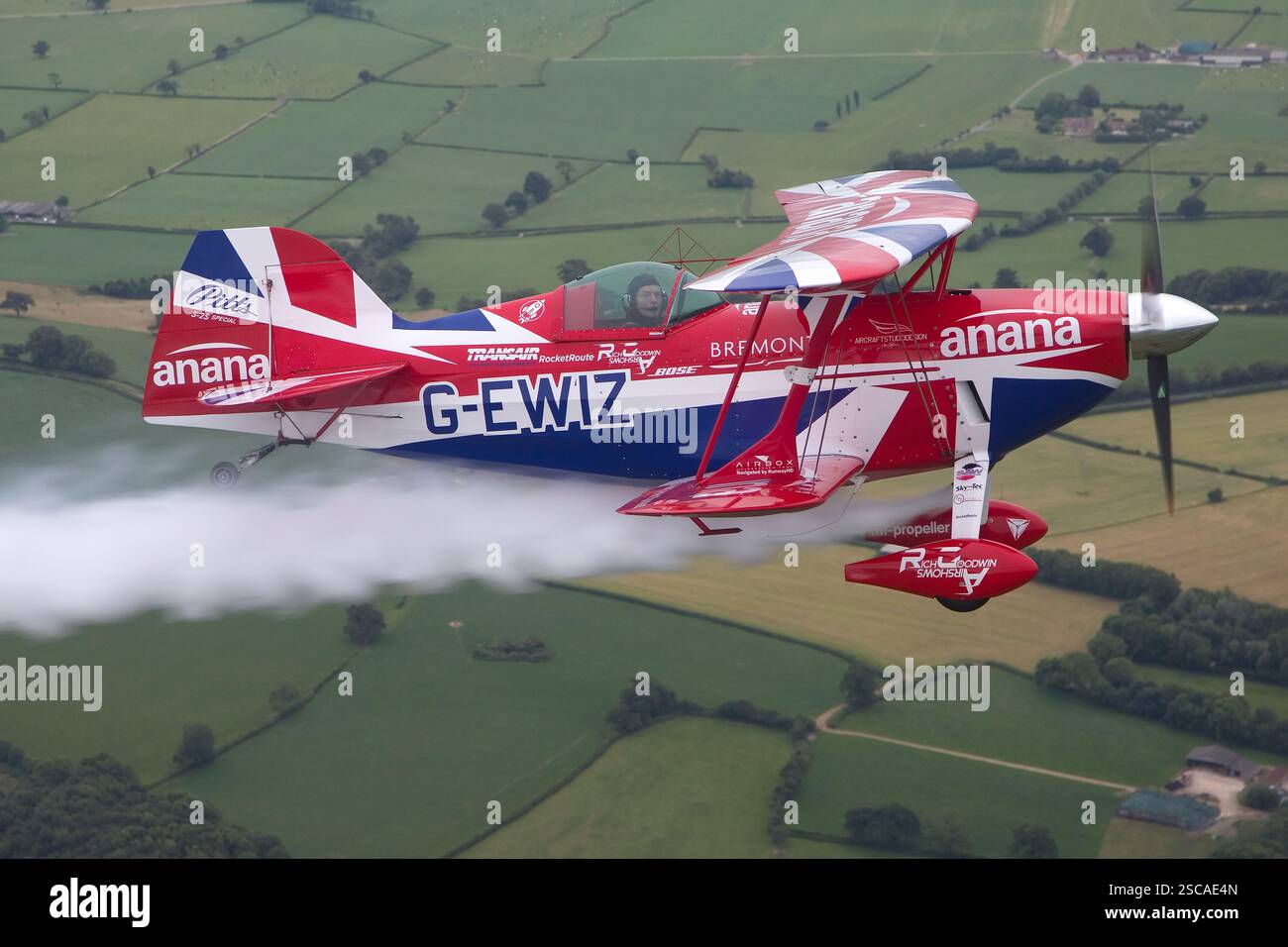 A Pitts Special aerobatic aircraft executing a loop during an air-to ...