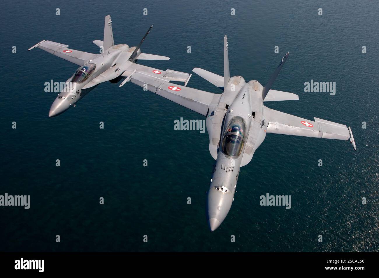 Swiss Air Force F/A-18 Hornet in flight during an air-to-air photo shoot. Powered by the General ...