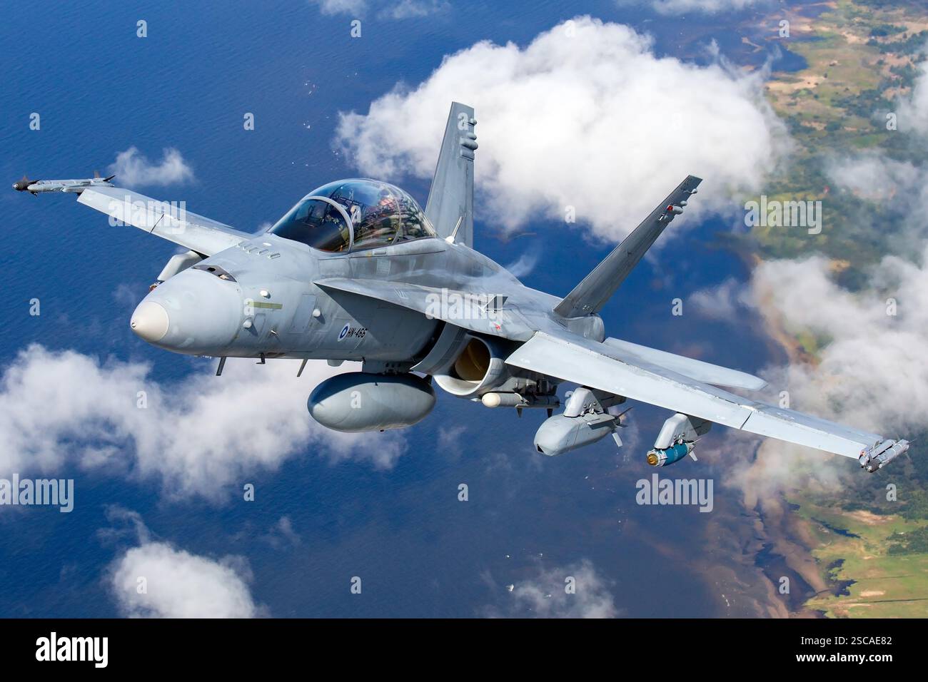 A Finnish Air Force F/A-18 Hornet in flight during an air-to-air photo ...