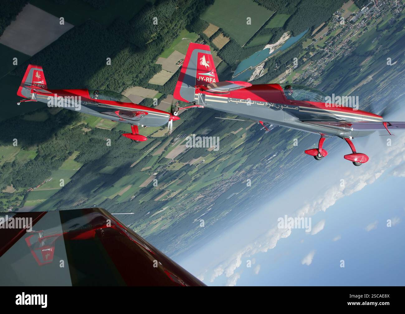 Royal Jordanian Falcons, Extra EA-300LP, executing a tight formation ...