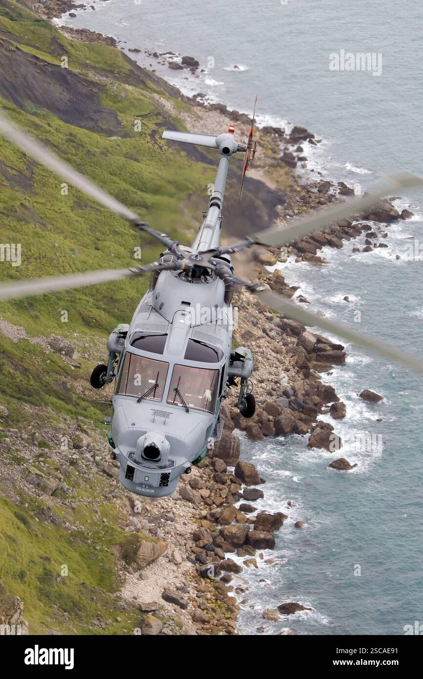 Royal Navy Lynx performing a tactical maneuver during an air-to-air ...