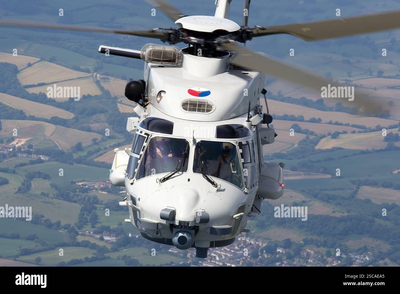 A Royal Netherlands Air Force NH90 helicopter captured in flight during an air-to-air photo ...