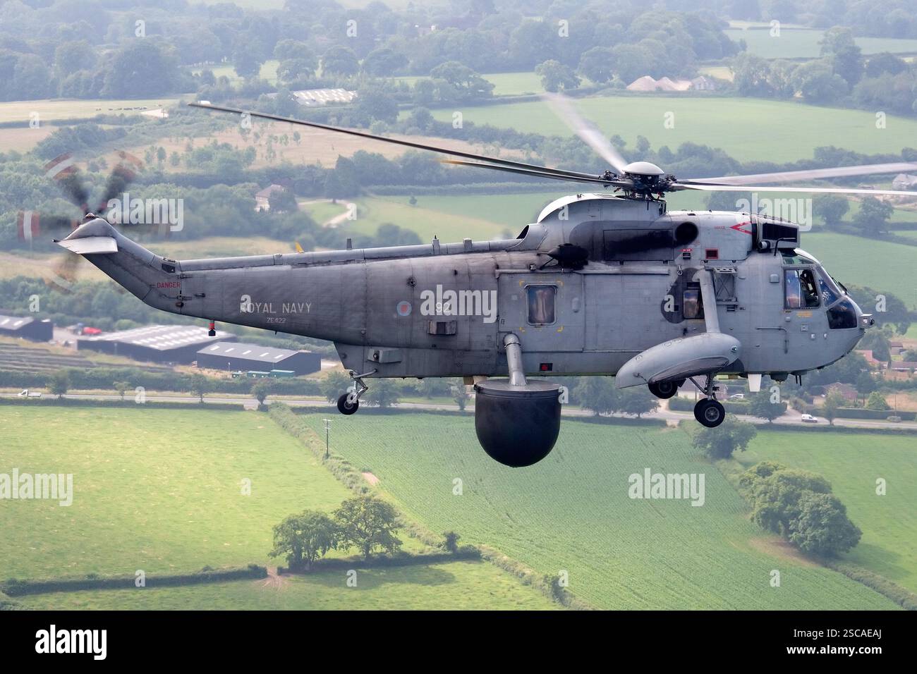 A Royal Navy Sea King helicopter in flight. The Sea King, powered by ...