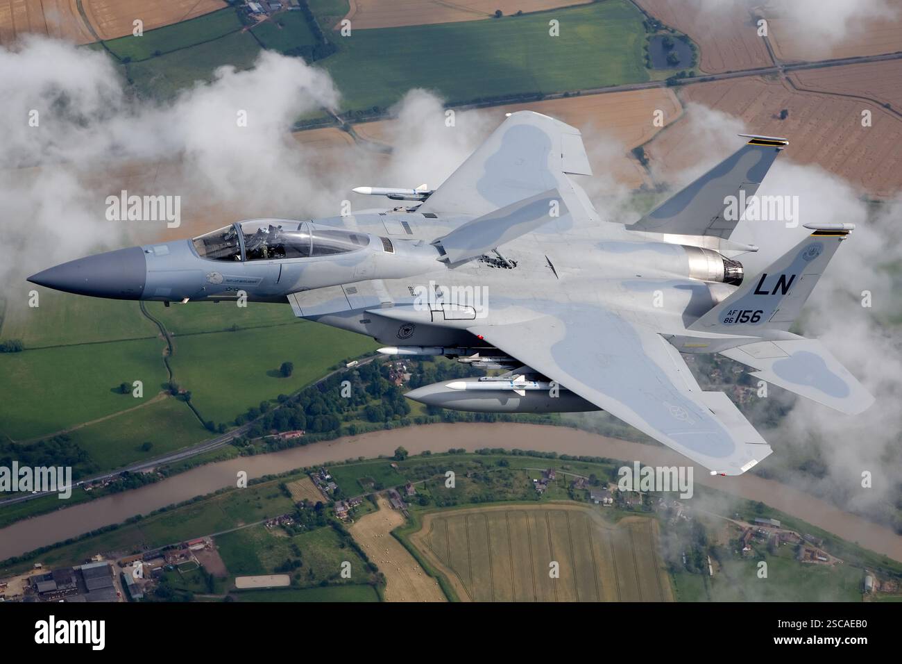 US Air Force F-15 Eagle performing a high-speed pass Stock Photo - Alamy