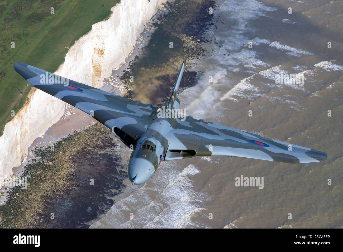 Avro Vulcan flying over the English countryside during an air-to-air ...