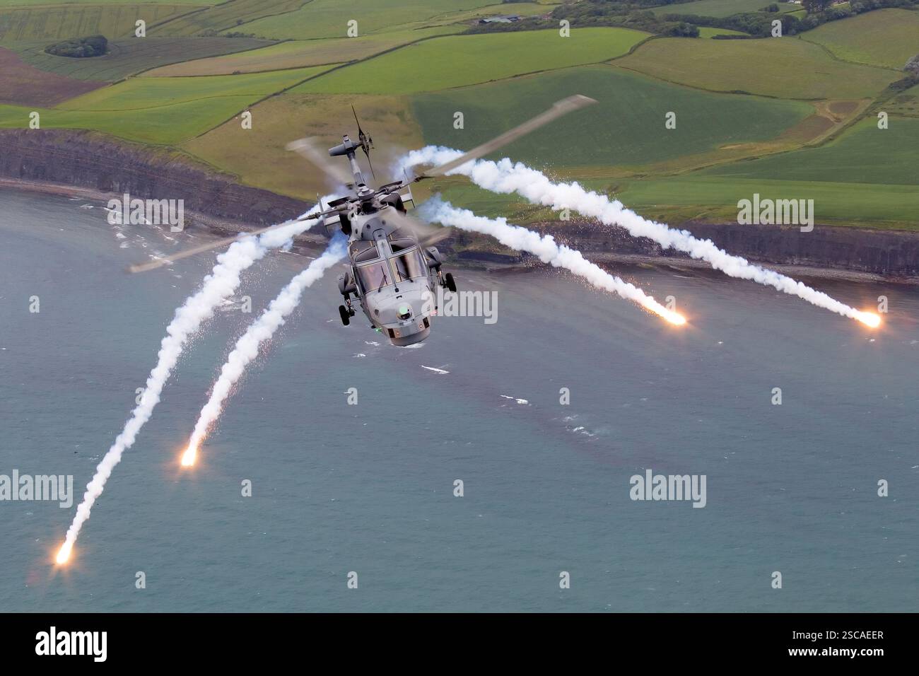 Royal Navy Lynx helicopter hovering, demonstrating its role in search ...