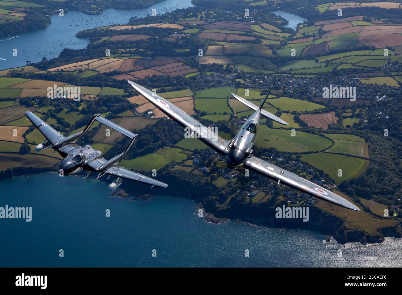 Supermarine Spitfire and De Havilland Sea Vixen flying together in ...