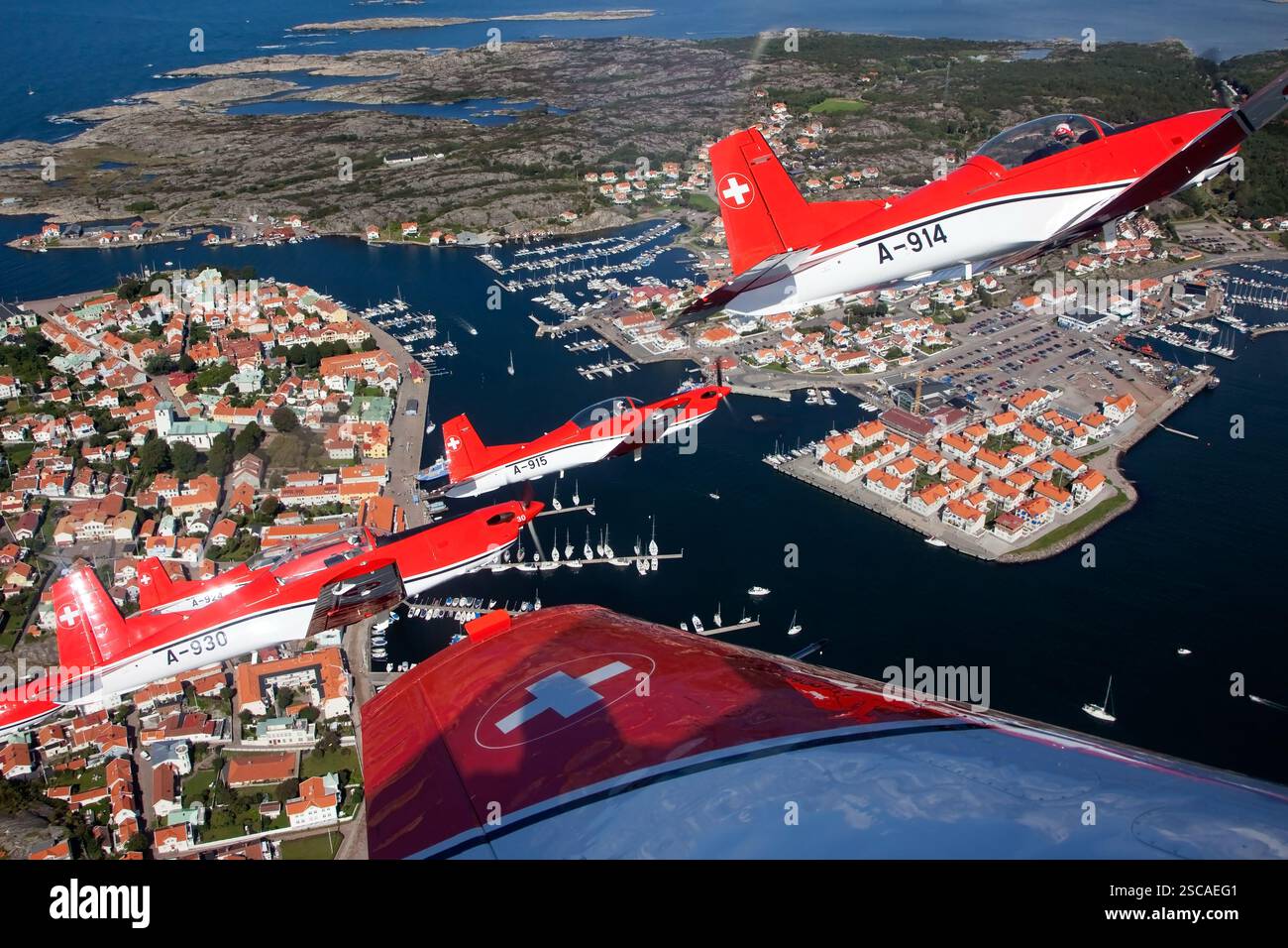 Swiss Air Force PC-7 Team flying in tight formation during an air-to ...