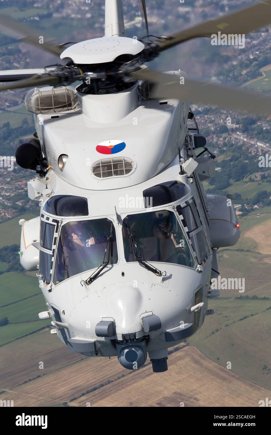 A second image of the Royal Netherlands Air Force NH90 helicopter in flight, showing its ...